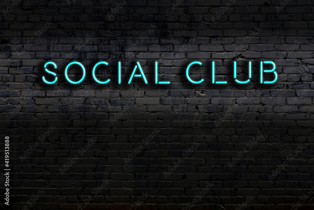 Neon sign. Word social club against brick wall. Night view Stock ...