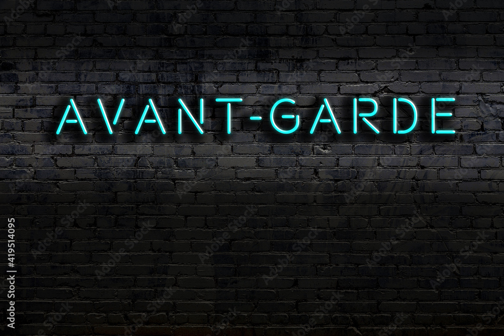 Neon sign. Word avant-garde against brick wall. Night view Stock ...