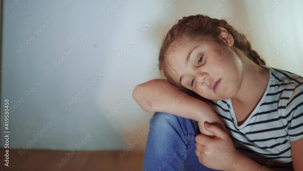 domestic violence. little girl with bruises and abrasions on her face ...