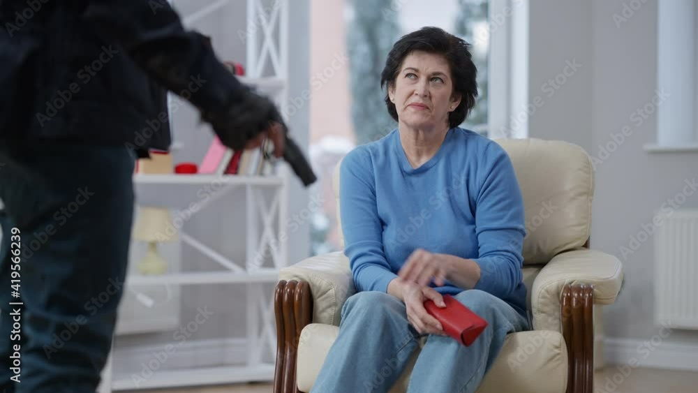 Portrait of nervous scared Caucasian woman with wallet looking at ...