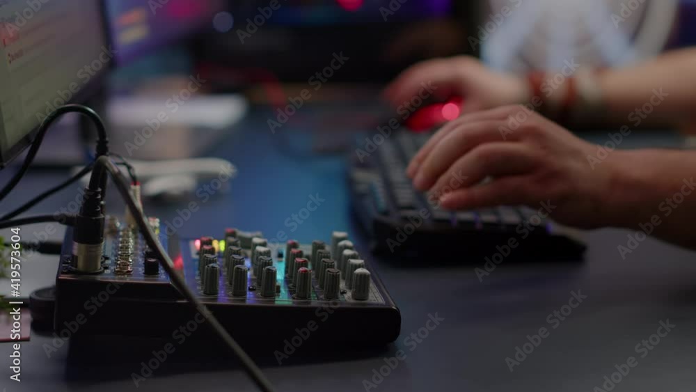 Close up of professional keyboard with RGB lighting streaming at chat ...