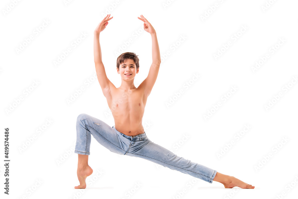 A Teenage Ballet Dancer Poses Barefoot Isolated On A White Background