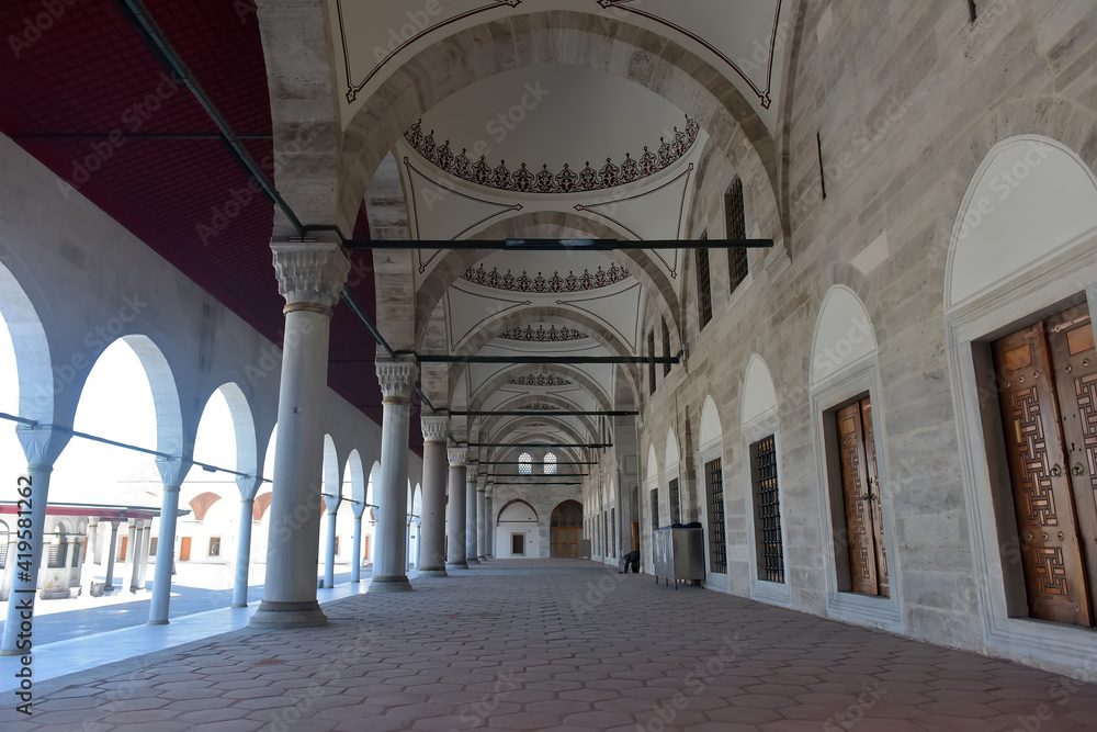 Mihrimah Sultan Mosque in Uskudar District. Muslims and tourists walk ...