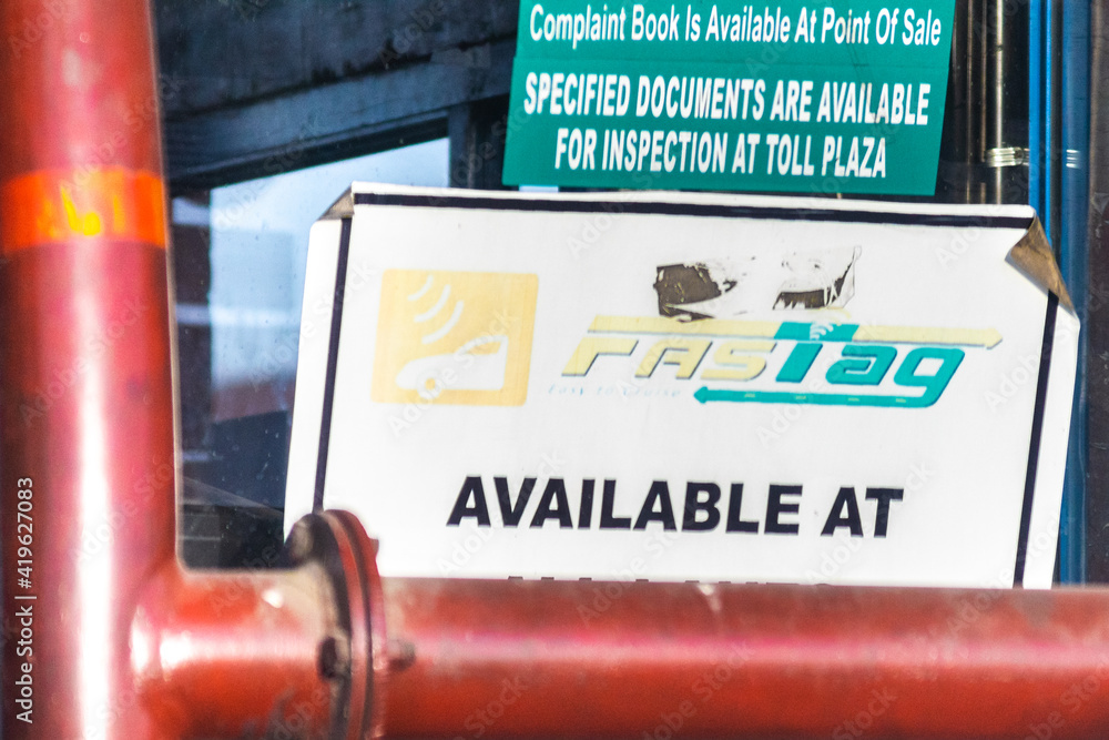 Fast Tag available sign near a toll booth showing the new cashless RFID ...
