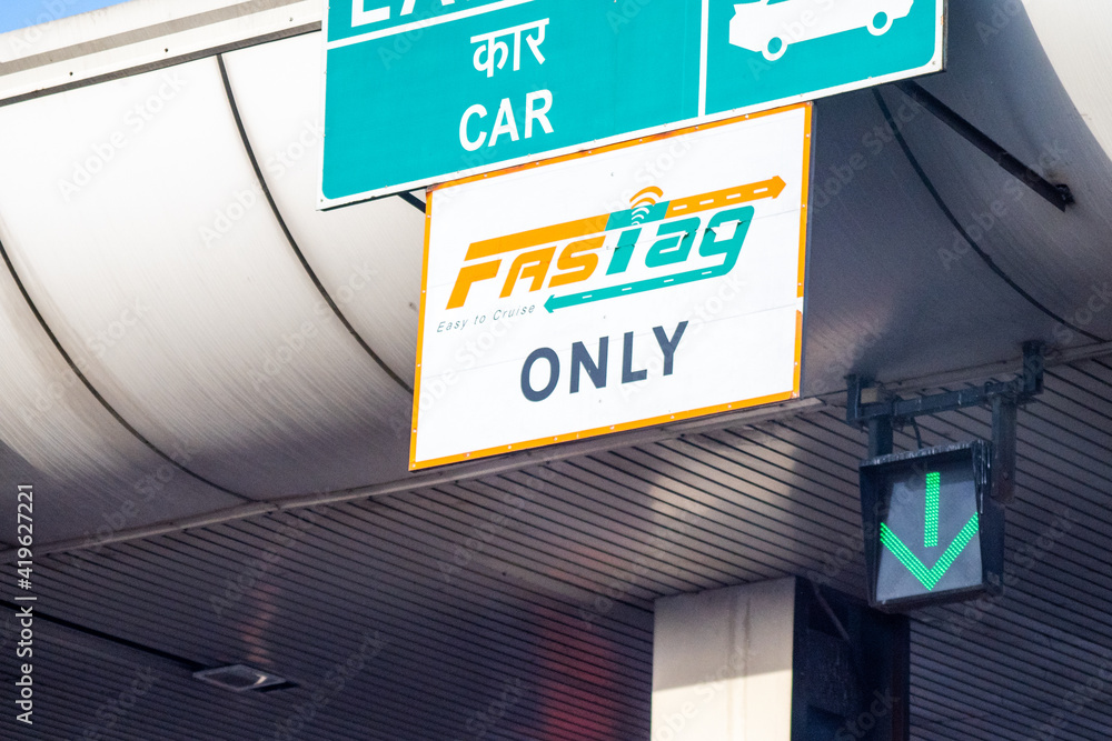 Fast Tag sign near a toll booth showing the new cashless RFID based ...