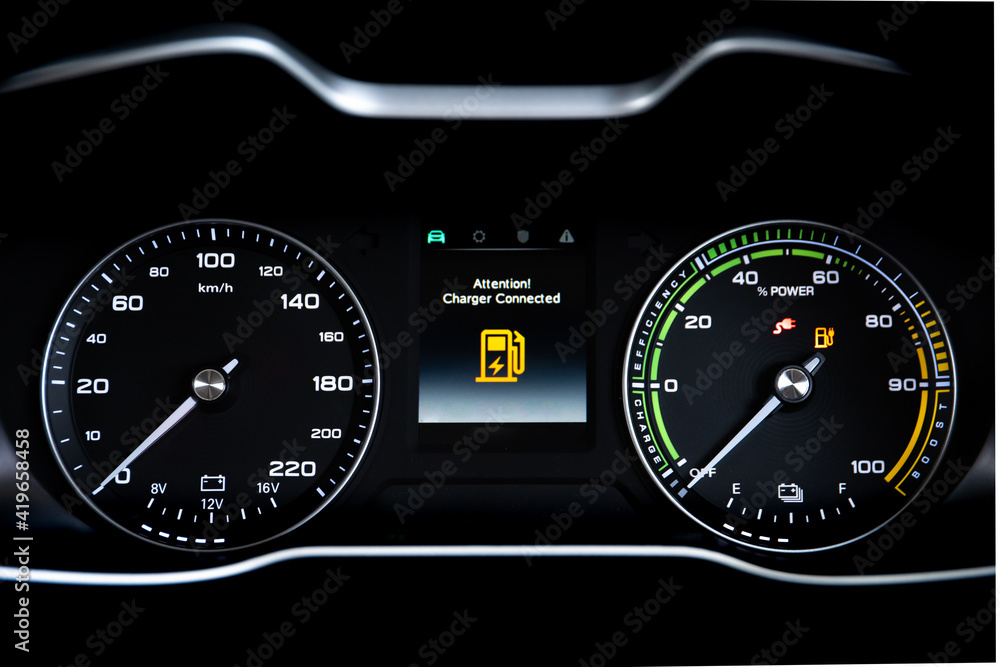 Digital modern dashboard in a electric vehicle - EV while chargingใ ...