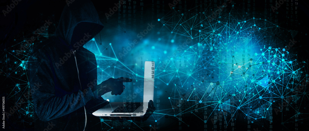 Cybersecurity, computer hacker with hoodie Stock Photo | Adobe Stock