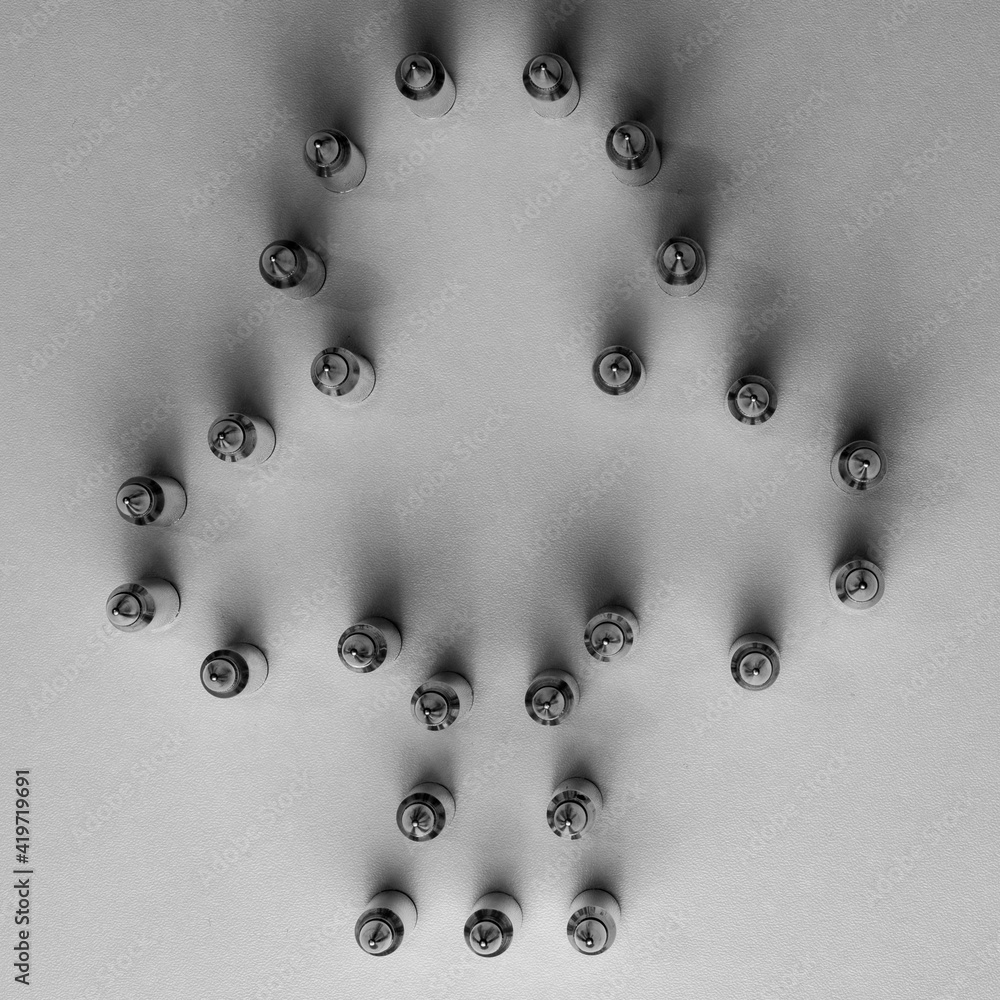 5.56mm bullets arranged in the shape of a club in black and white Stock ...