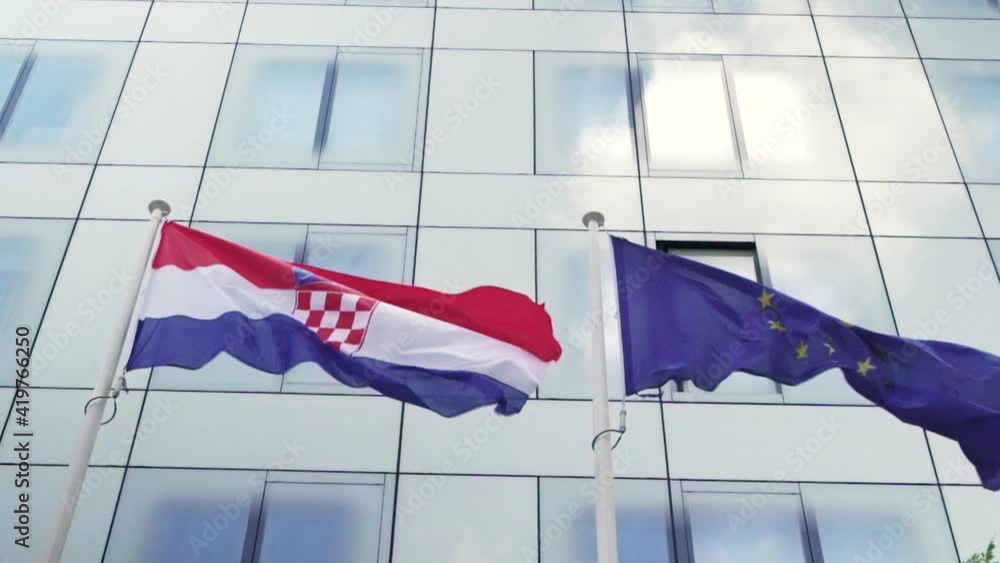 Flags Of Croatia And European Union Waving On The Flagpole In Front Of ...