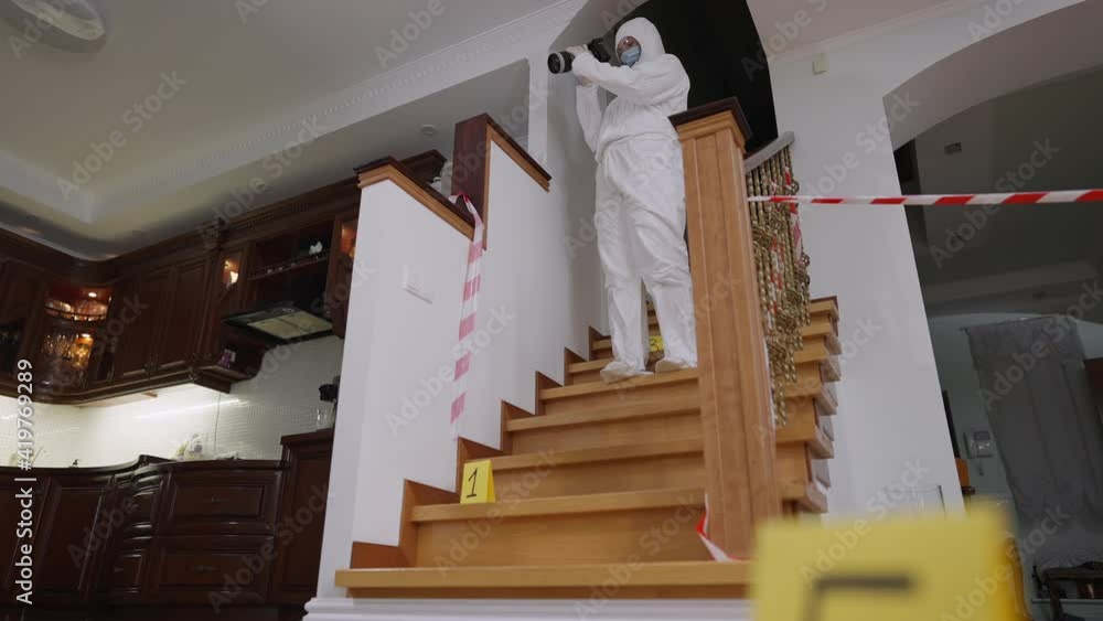 Wide shot portrait of concentrated expert forensic scientist in ...