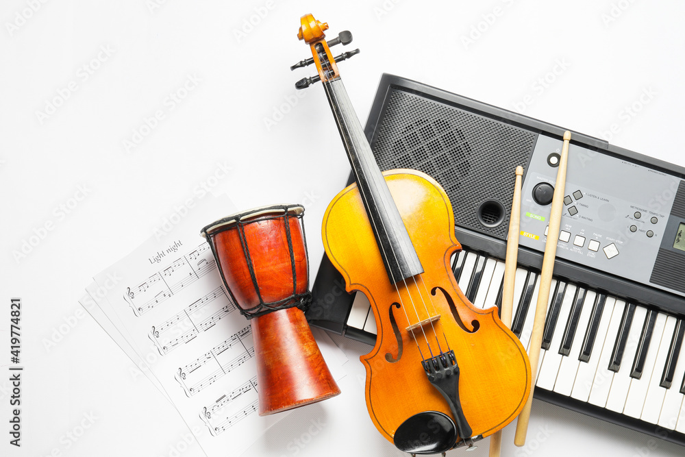 Different musical instruments and music notes on white background Stock ...