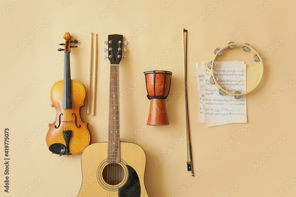 Different musical instruments and music notes on color background Stock ...
