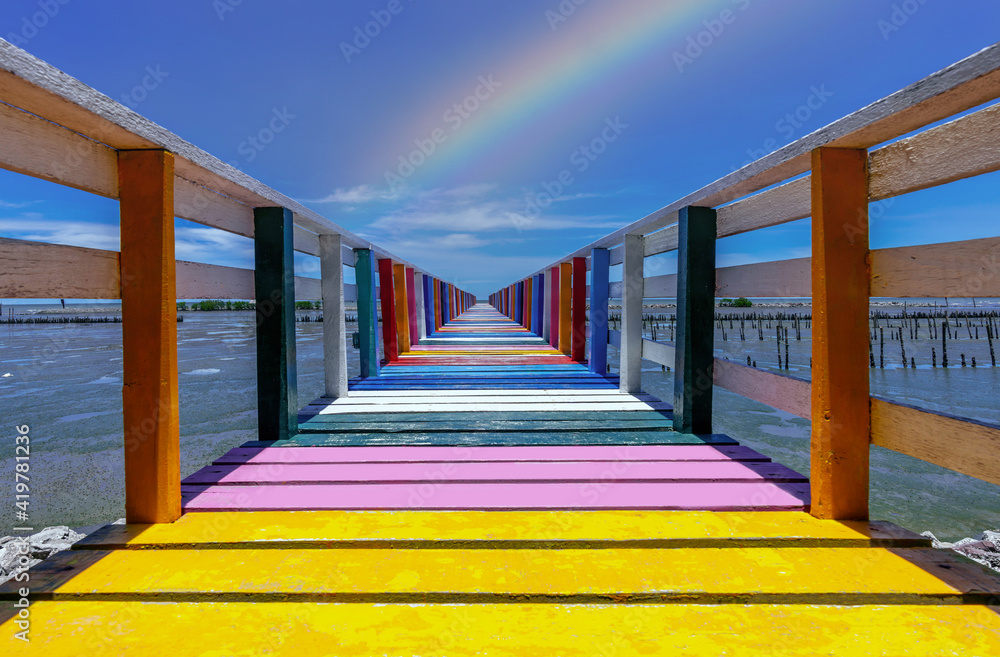 Rainbow bridge in Thailand.View of The colorful wood bridge extends ...