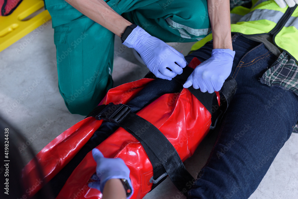 First aid for injuries in work accidents. Use emergency vacuum splint ...