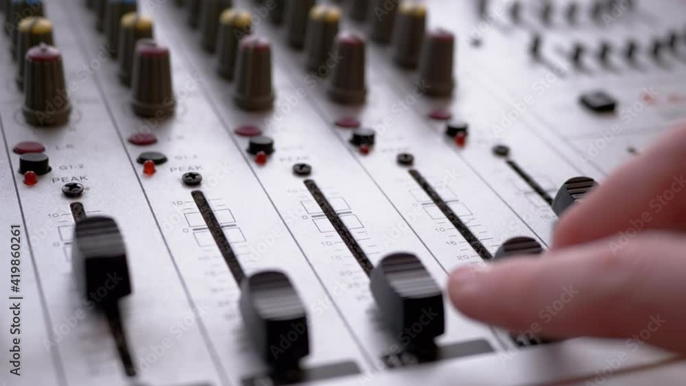 Sound Engineer, DJ Moves Sliders with Fingers on Audio Mixer in ...