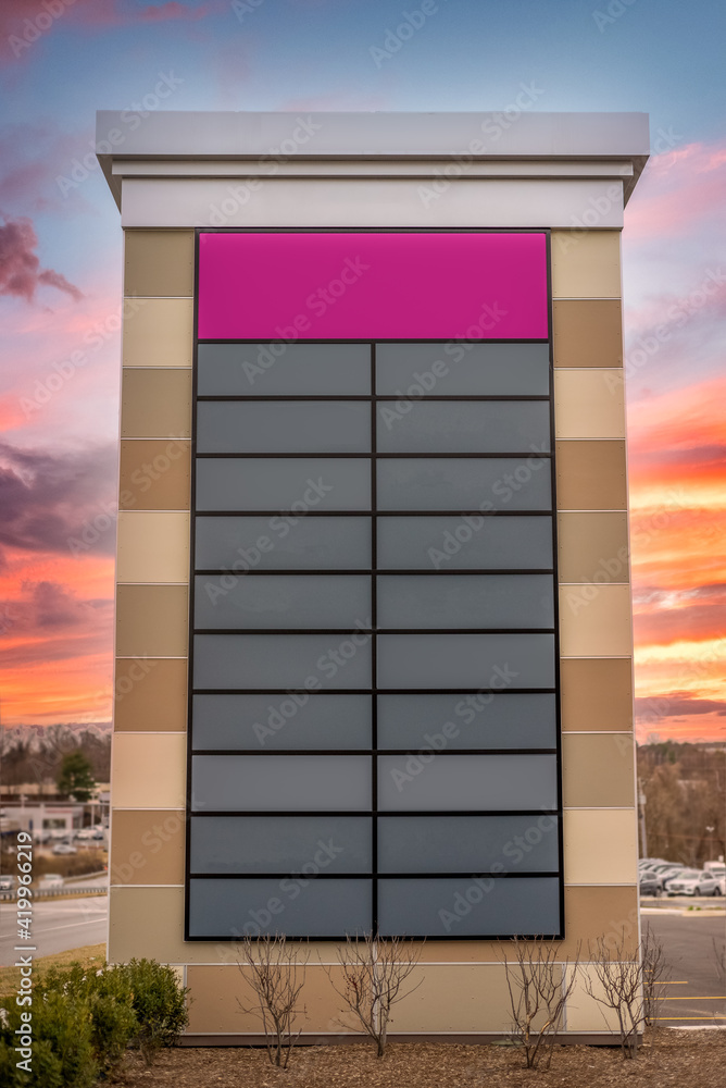 Tall decorative strip mall pylon, monument, advertisement billboard ...