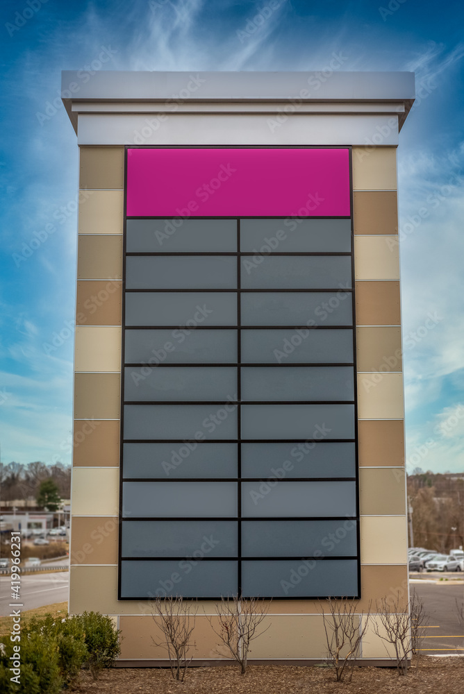 Tall decorative strip mall pylon, monument, advertisement billboard ...