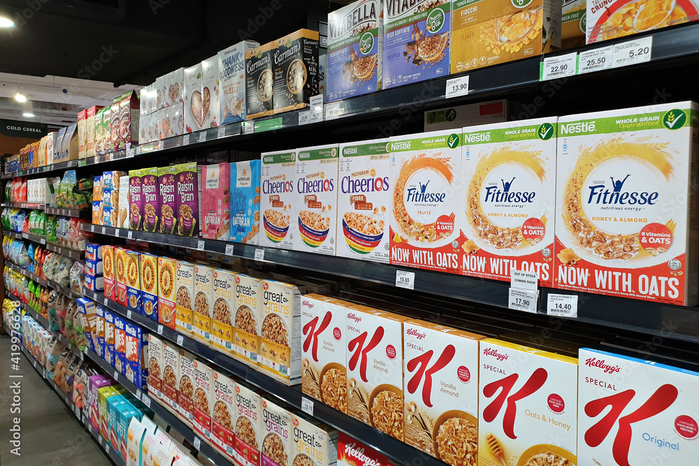 Various brands of breakfast cereals on store shelves. Breakfast cereal ...