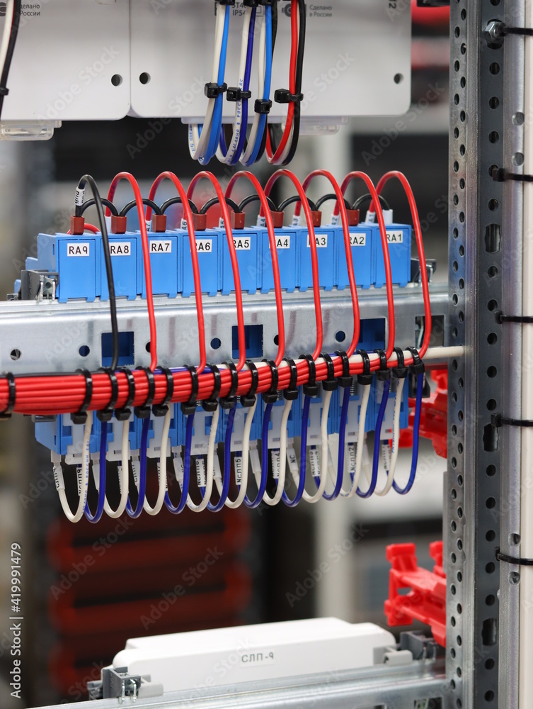 The reverse side of the electrical panel with the installation of wires ...