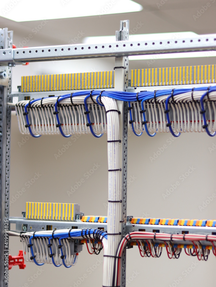 The reverse side of the electrical panel with the installation of wires ...