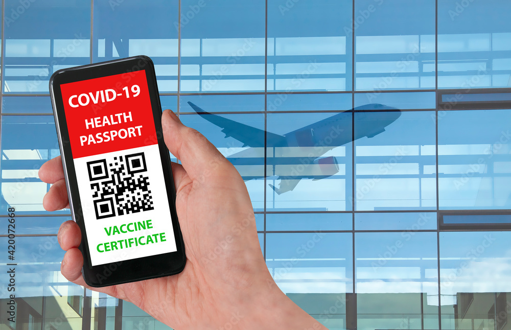 Stockfoto Person using digital health passport app in mobile phone with ...