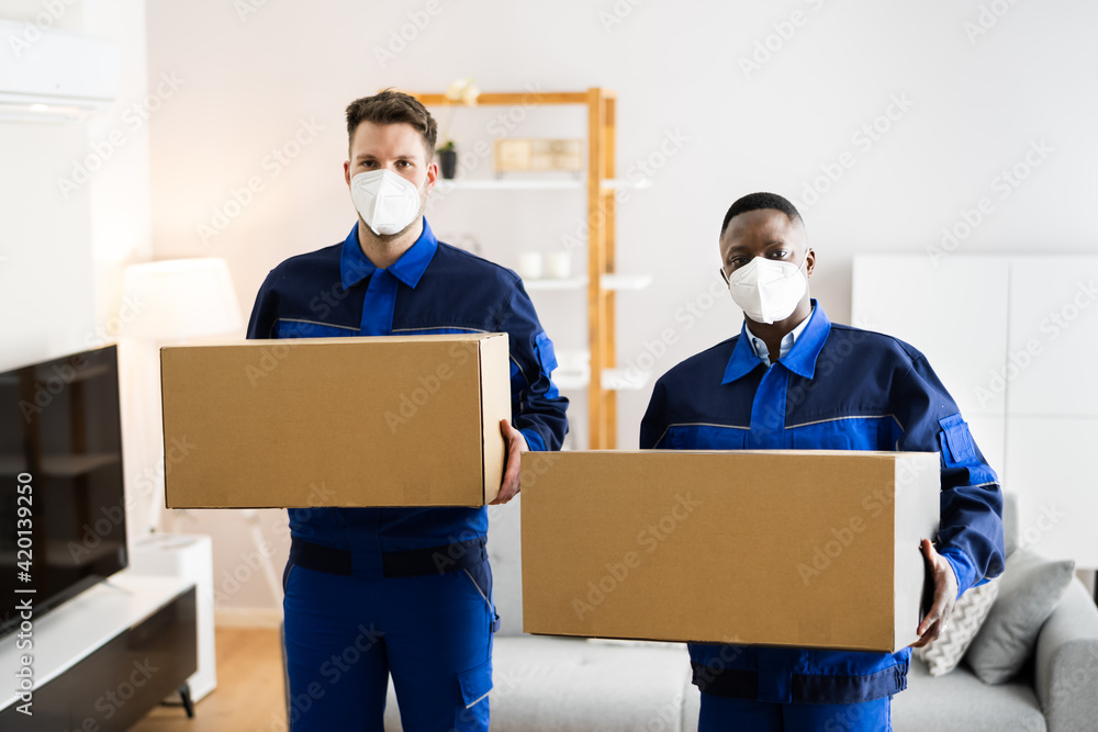 Delivery Mover Standing Carrying Box Stock Photo | Adobe Stock