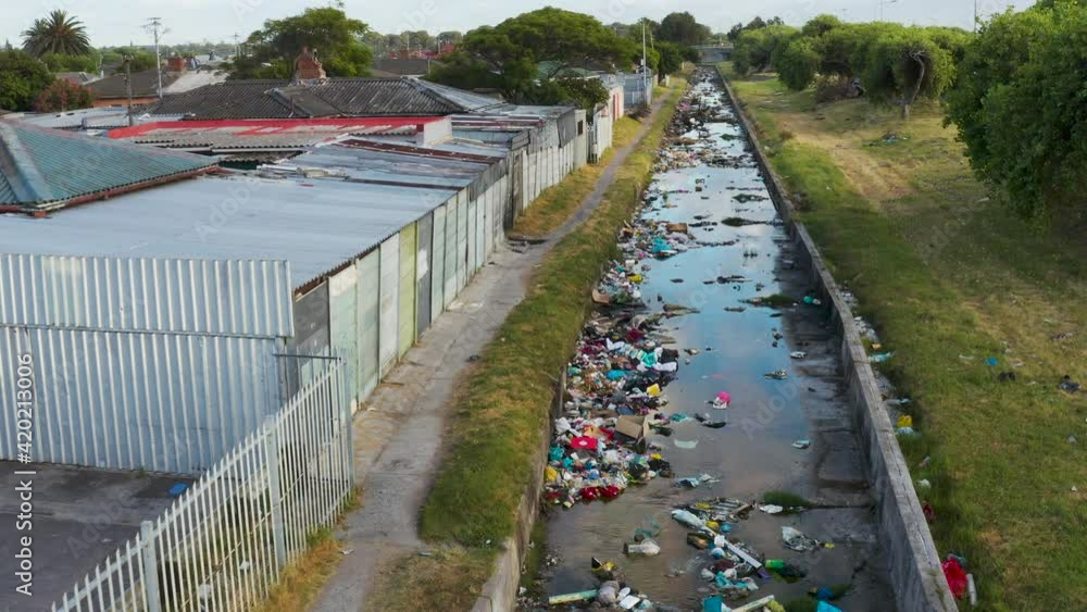 Water pollution. Close-up aerial zoom out view of horrific plastic ...