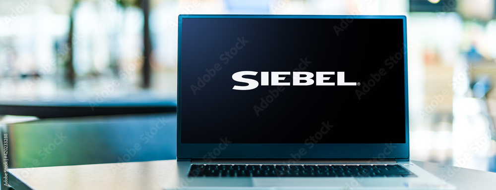 Laptop computer displaying logo of Siebel CRM Stock Photo | Adobe Stock Laptop computer displaying logo of Siebel CRM Stock Photo | Adobe Stock