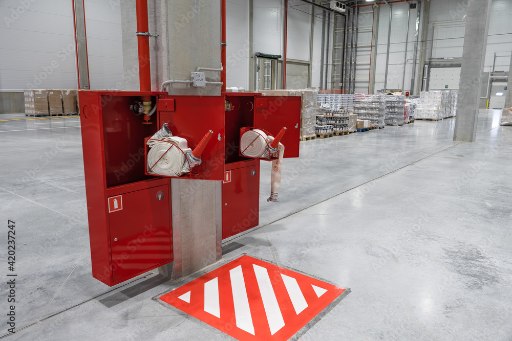Foto de fire safety in the warehouse. new fire hydrants. red box. fire ...
