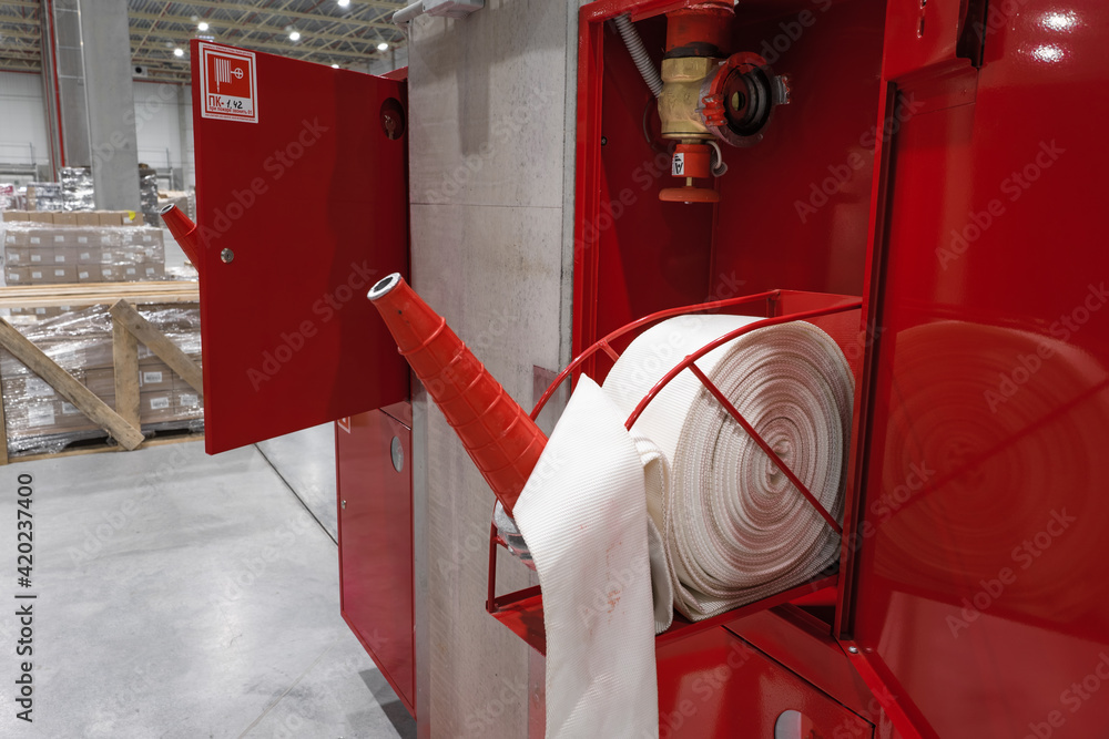 fire safety in the warehouse. new fire hydrants. red box. fire ...