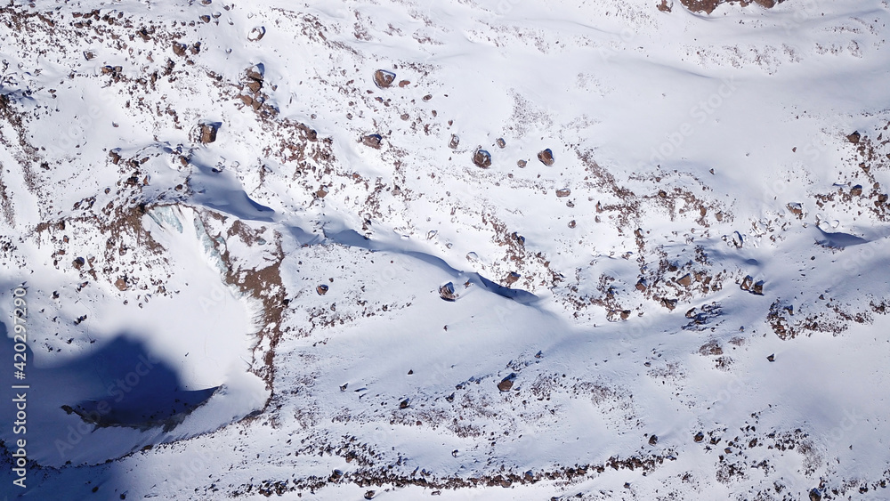 A huge wall of ice. Bogdanovich Glacier in the mountains of Almaty. The ...
