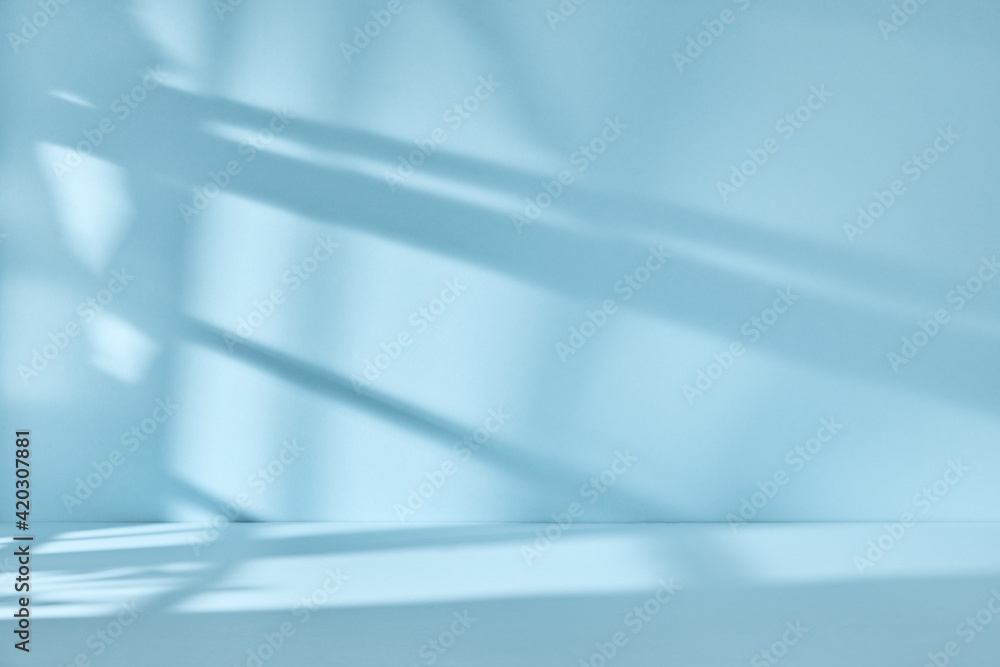 Abstract blue background with drop shadow and light. Backdrop for ...