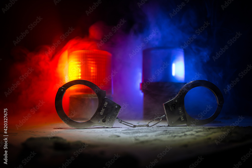 Police raid at night and you are under arrest concept. Silhouette of ...