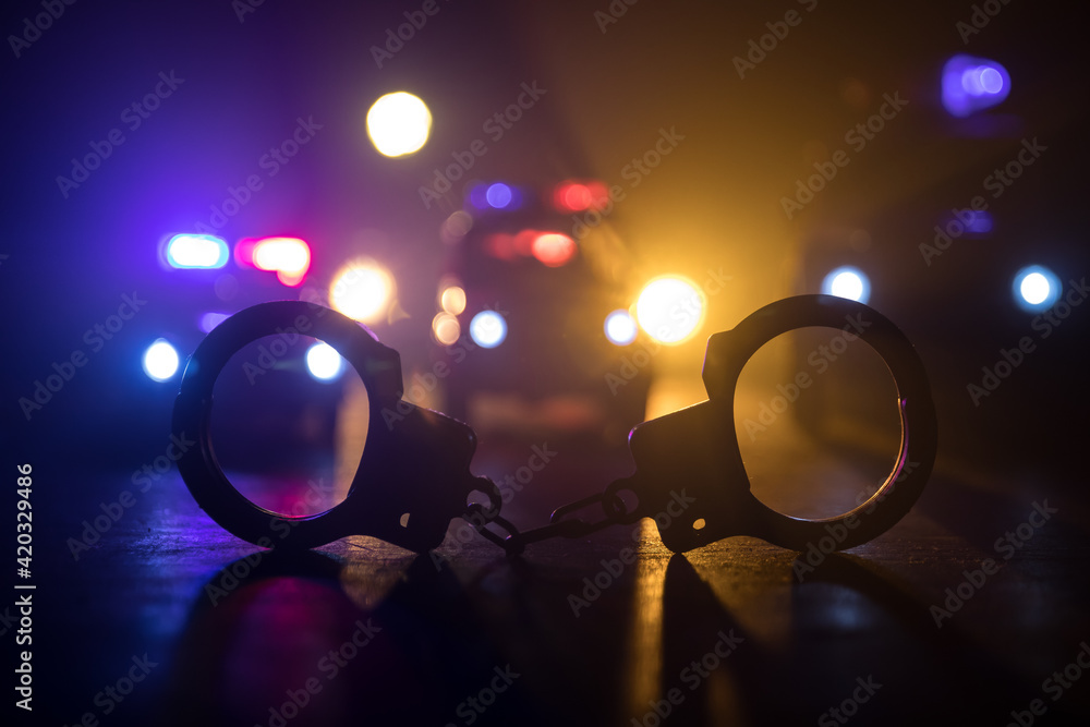 Police raid at night and you are under arrest concept. Silhouette of ...