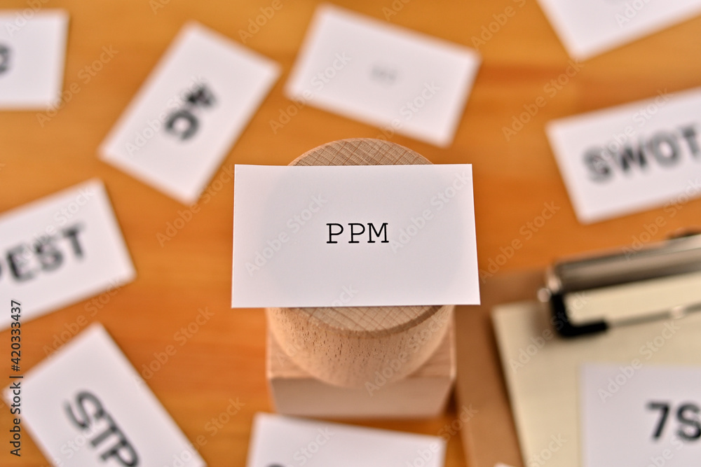 There is a piece of paper with the word PPM written on it. It was an ...