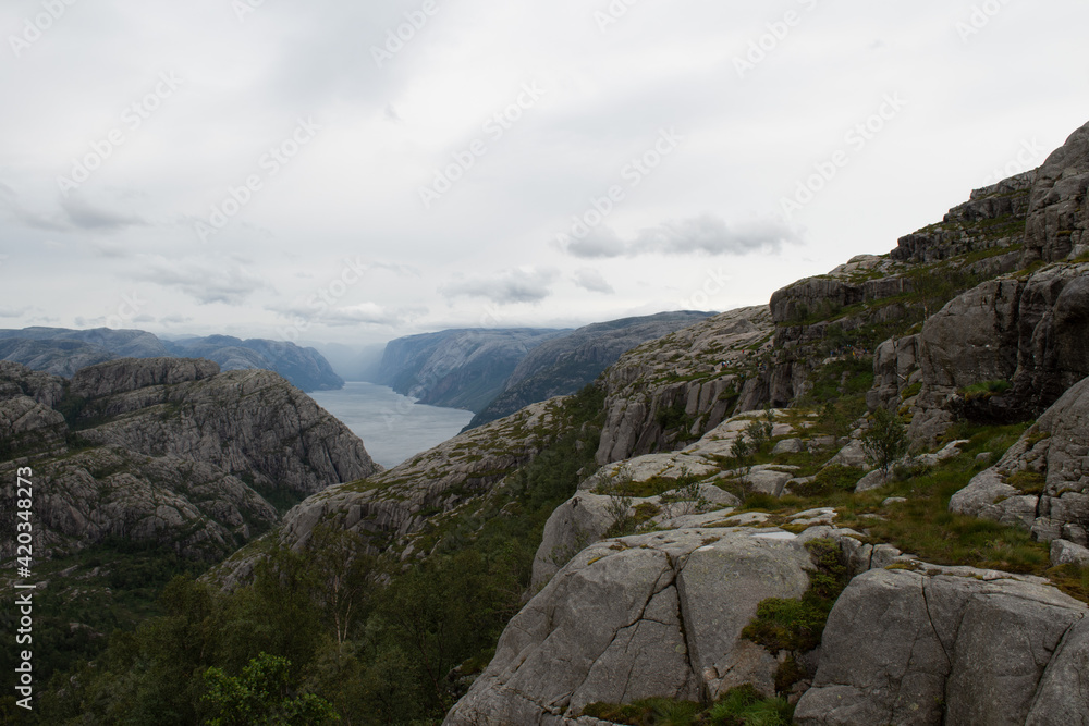 panorama from Preikestolen cliff in norway with the fjord and steep ...