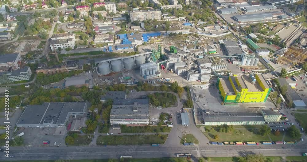 Fly over a large railway junction. Freight trains stand at the railway ...