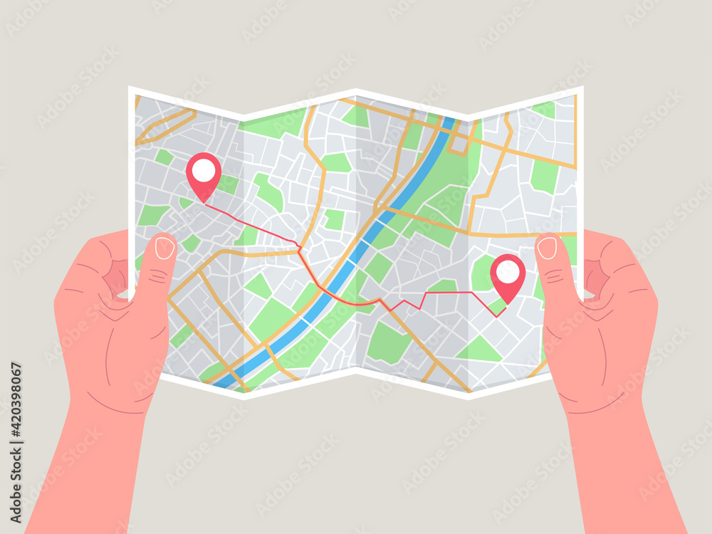 Hands holding paper map. Folded map in hands of men. Tourist look at ...