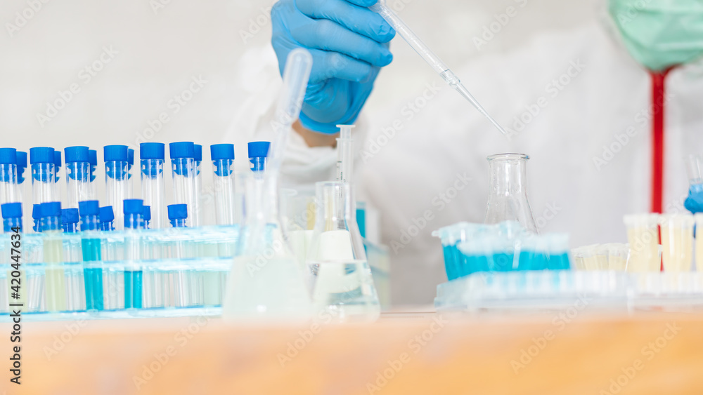 Laboratory pharmacological research scientists develop vaccines, a ...