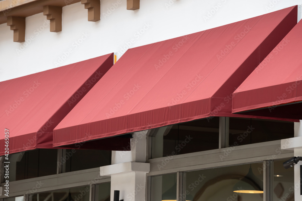 red awning over window of shop. exterior canvas roof. Stock Photo ...