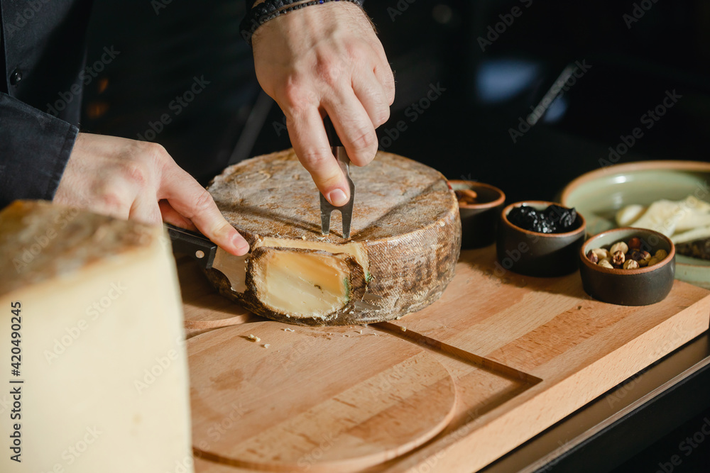 Preparing Beautiful Homemade French Cheese For Serving With Dry Fruits ...