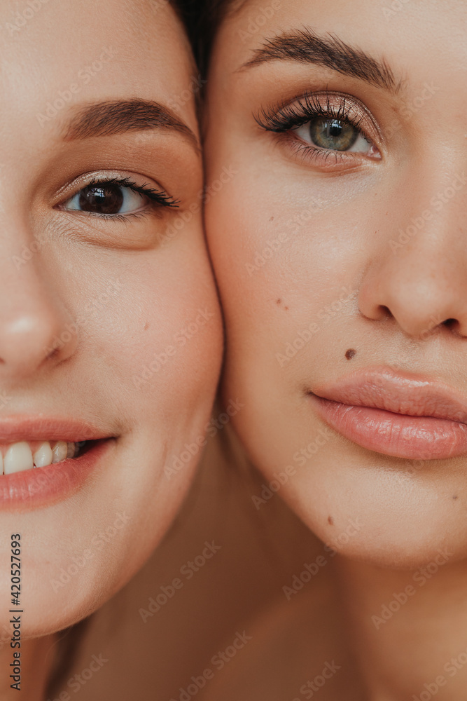 Charming women with perfect skin looking at camera Stock Photo | Adobe ...
