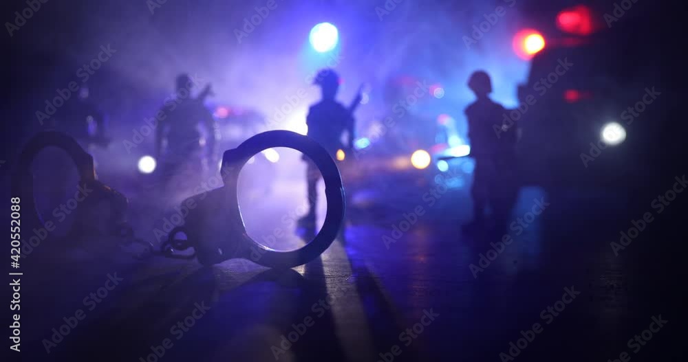 Police raid at night and you are under arrest concept. Silhouette of ...