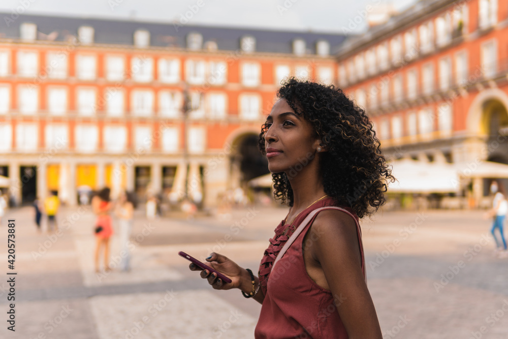 Black girl using phone Stock Photo | Adobe Stock