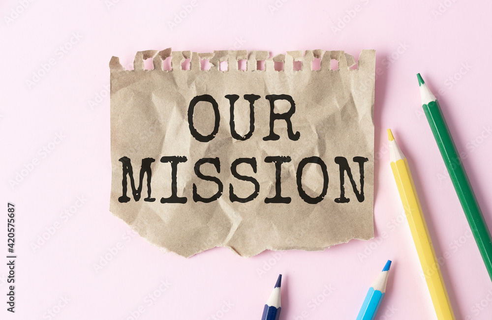 Our Mission text on paper. Word Our Mission on torn paper. Concept ...
