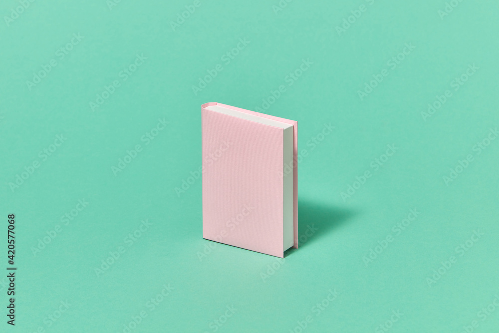 One mockup pink craft book made from paper. Stock Photo | Adobe Stock