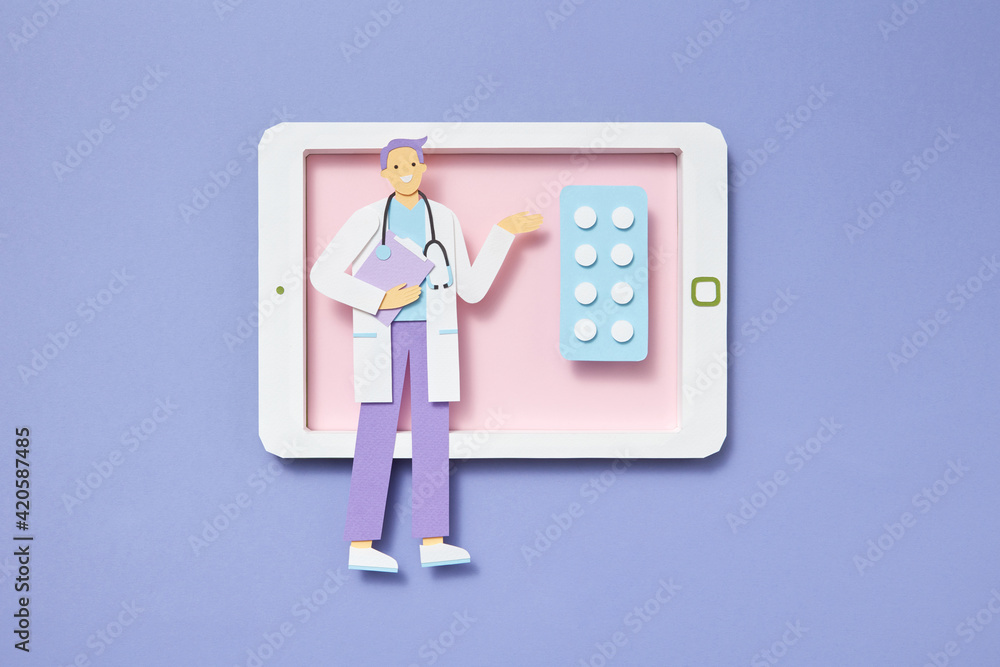 Papercraft doctor on a tablet screen with meds. Stock Photo | Adobe Stock