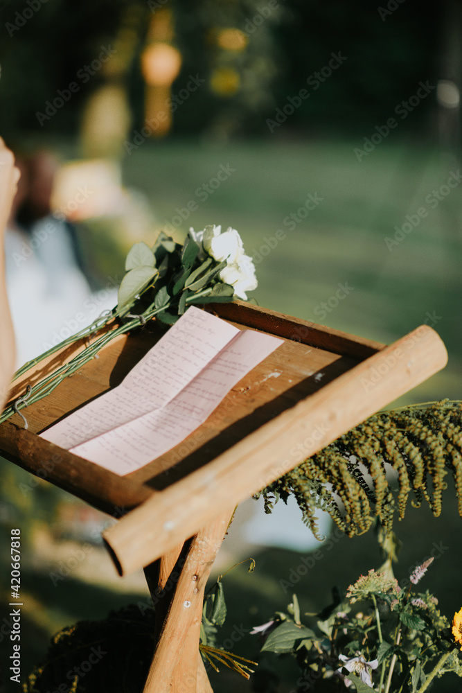 Speech table or desk in wood with pink handwritten speech and white ...