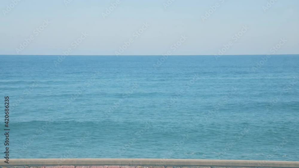Calm blue ocean water at the beach in a horizontal lines. Stock ビデオ ...