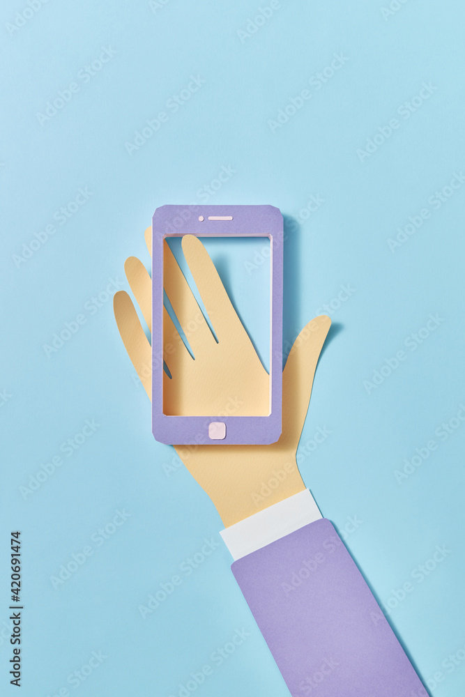 Cut papercraft man's hand hold a paper smartphone. Stock Photo | Adobe ...